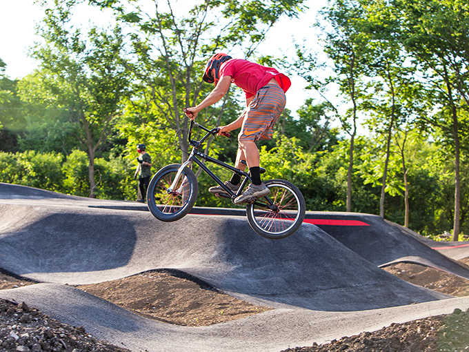 Catching air on the BMX track – where gravity becomes both adversary and accomplice in the pursuit of two-wheeled thrills.