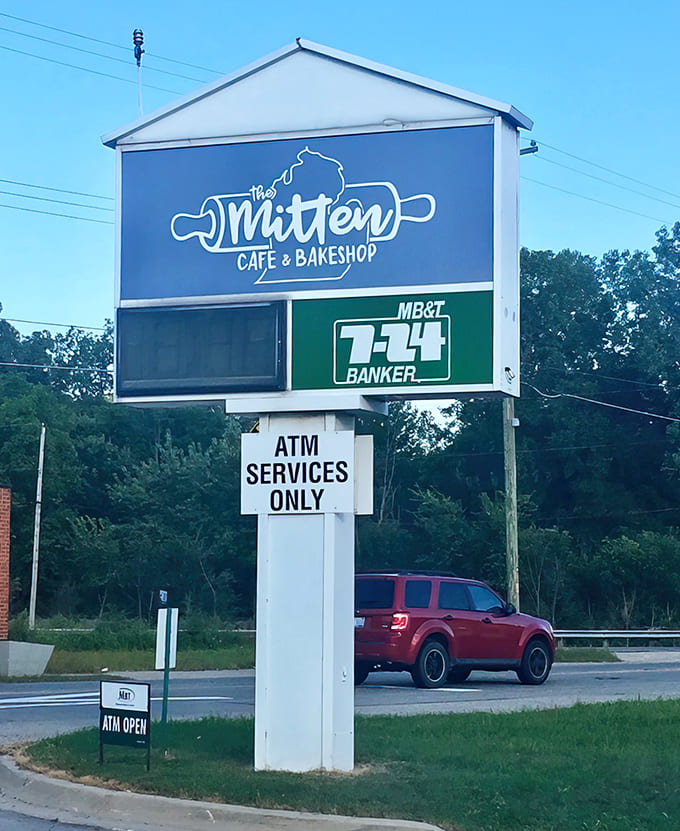 The roadside sign for The Mitten Cafe & Bakeshop beckons travelers like a lighthouse guides ships, promising delicious refuge from whatever chain restaurants you were considering.