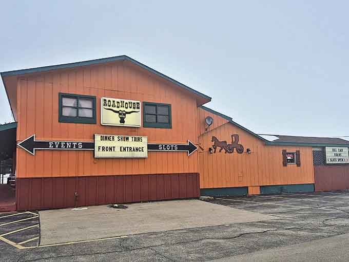 Even in daylight, the Road House's distinctive orange exterior hints at the colorful experiences waiting inside&mdash;paranormal and culinary alike.