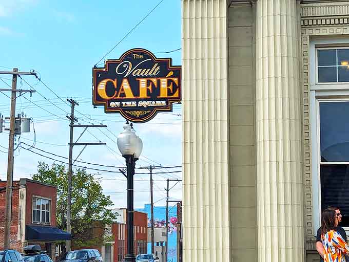 The Vault Caf&eacute; sign hangs proudly outside, a beacon for breakfast lovers seeking substance with style in downtown Marion's historic square.