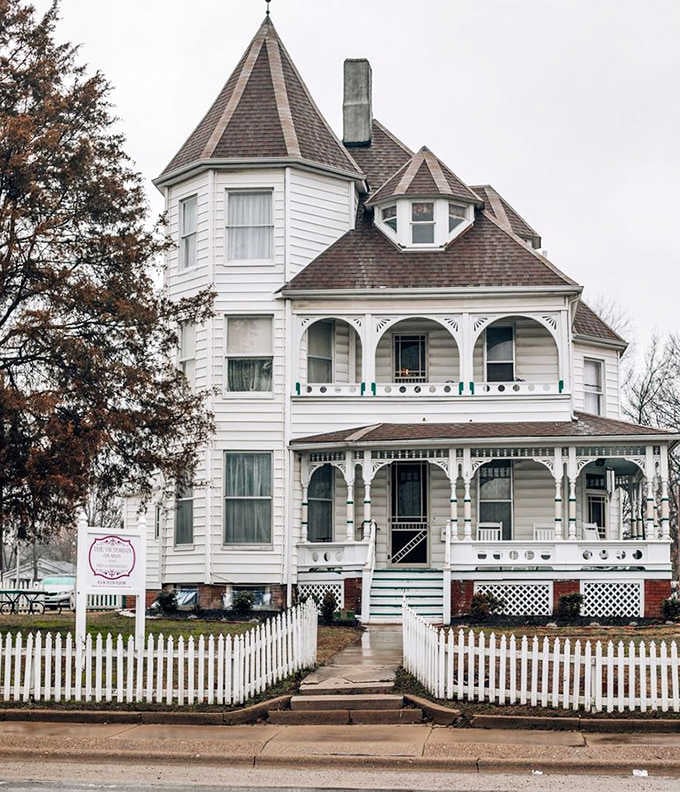 Even on cloudy days, The Victorian on Main's architectural details shine &ndash; from its distinctive turret to the intricate porch railings.