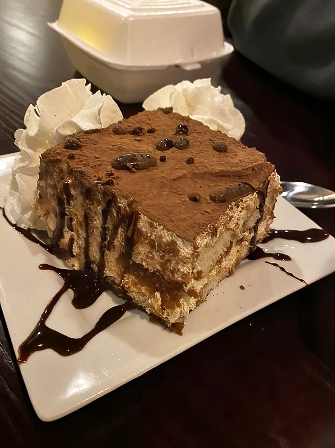 Tiramisu: A cloud-like square of tiramisu that strikes the perfect balance between coffee, chocolate, and mascarpone &ndash; the sweet finale to an Italian feast.