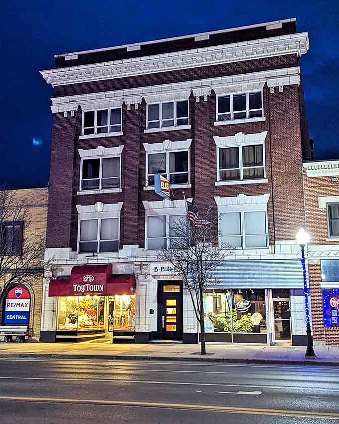 As dusk falls, Toy Town's warm glow illuminates Mitchell Street &ndash; a lighthouse of joy in a sea of adult responsibilities.