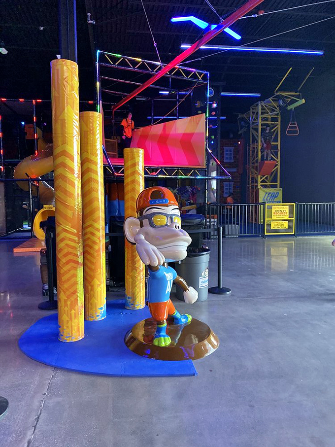 Even the mascot statue looks ready to bounce, capturing the infectious energy that makes Urban Air feel like physics took a vacation.