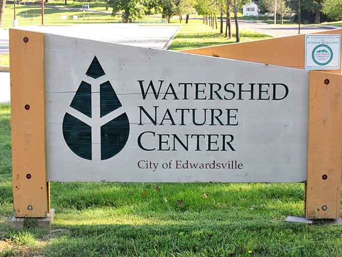 The entrance sign welcomes nature lovers to this 40-acre urban oasis, where city life dissolves into the gentle rhythms of the wild.