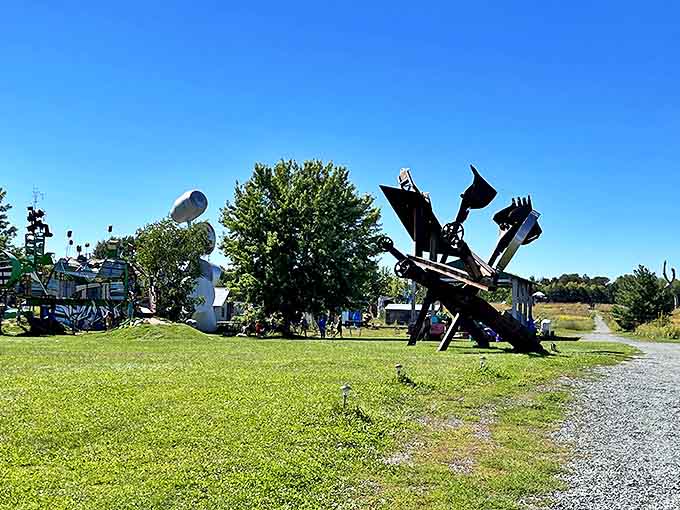 Metal discs balanced precariously create this kinetic sculpture that seems to defy gravity while celebrating industrial materials.