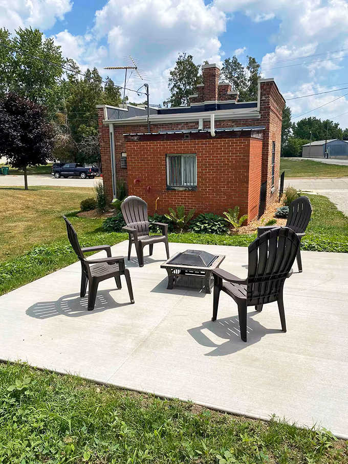 A peaceful patio area offers guests a place to relax outside their "cell," complete with fire pit for evening gatherings under Minnesota skies.