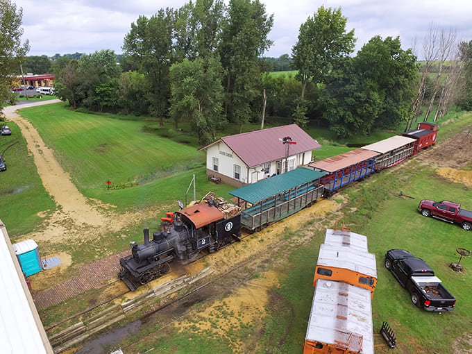 The aerial view reveals how this railroad operation fits perfectly into the surrounding countryside, a harmonious blend of human engineering and natural beauty that benefits both.