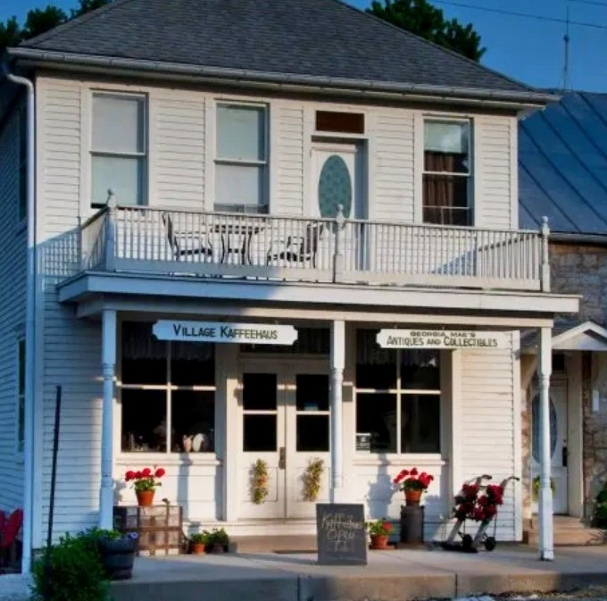The Village Kaffeehaus welcomes with flower-flanked steps &ndash; inside awaits coffee strong enough to make you reconsider your relationship with chain caf&eacute;s.