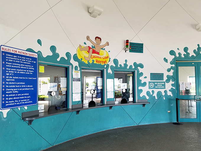 The ticket windows, adorned with splashy blue decorations, serve as the gateway to summer memories that don't require financial counseling afterward.