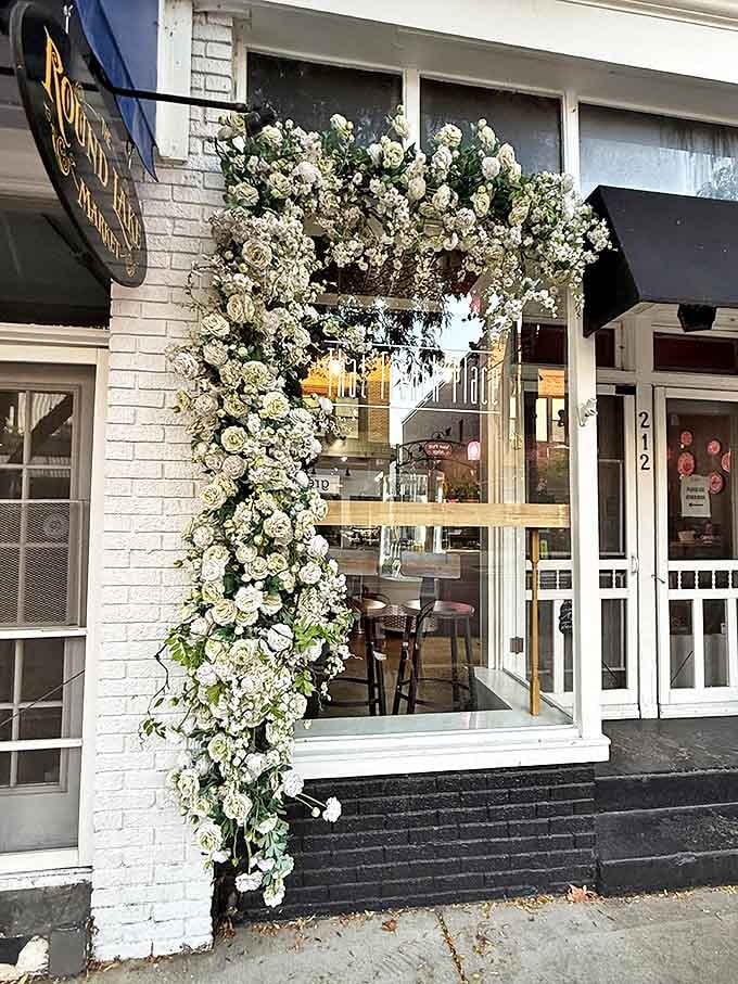 Those cascading white roses aren't just decoration &ndash; they're a promise of the romance and beauty waiting inside this Michigan gem.