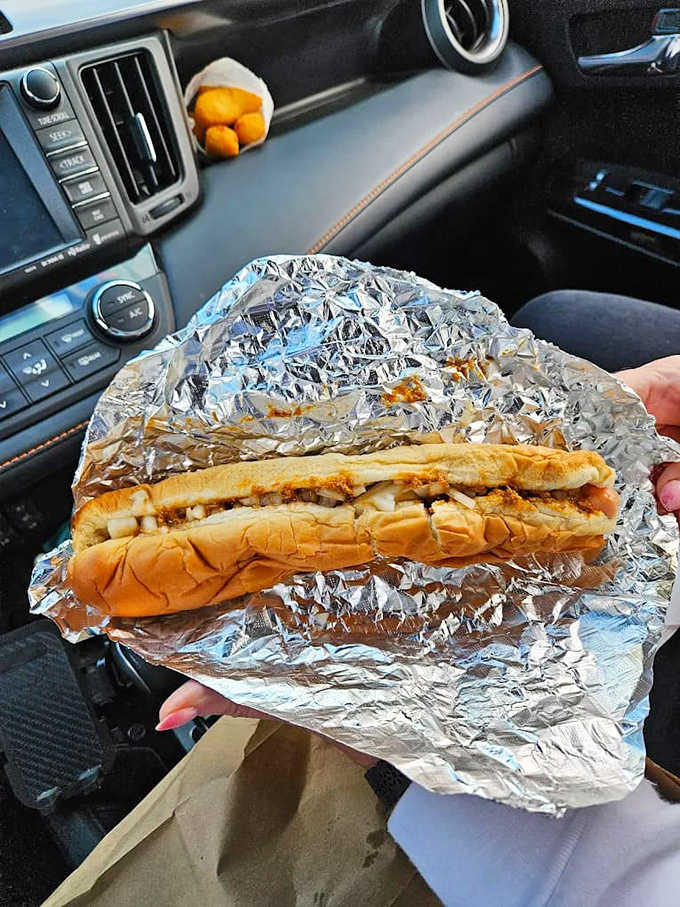 The foot-long experience &ndash; where the hot dog proudly extends beyond its bun, creating that delightful dilemma of where to take the first bite.