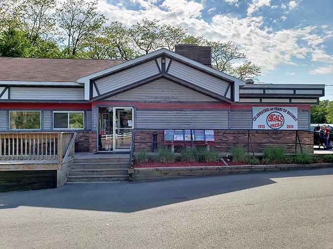 Front: Morning light bathes Big Al's welcoming facade, promising pizza perfection to all who enter. The journey to Manistee is worth it for this alone.