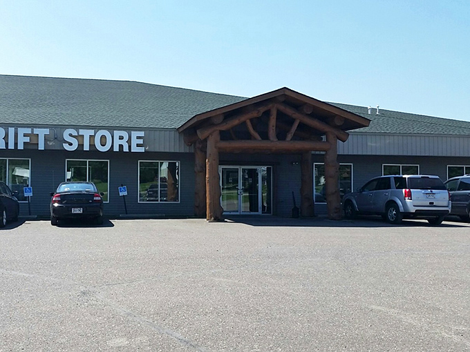 Morning at the thrift store &ndash; fresh possibilities await as sunlight highlights the distinctive entrance.