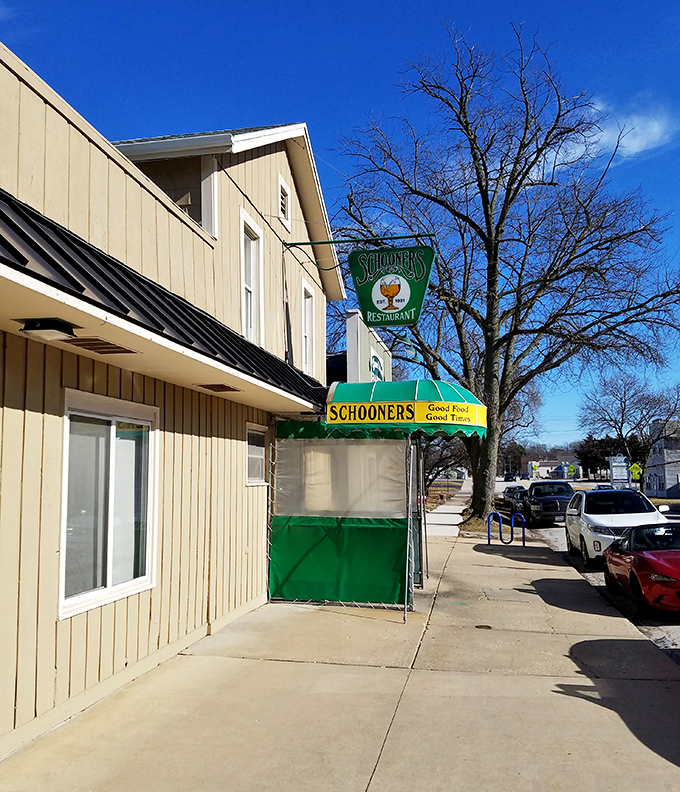 Even in winter, that distinctive green exterior and welcoming awning signal that tenderloin paradise awaits just steps away.
