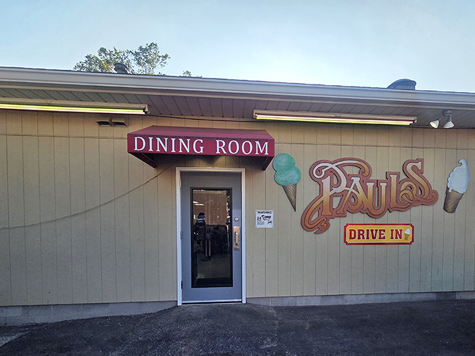 The unassuming entrance to the dining room belies the extraordinary experience waiting inside, where food and fellowship create lasting memories.