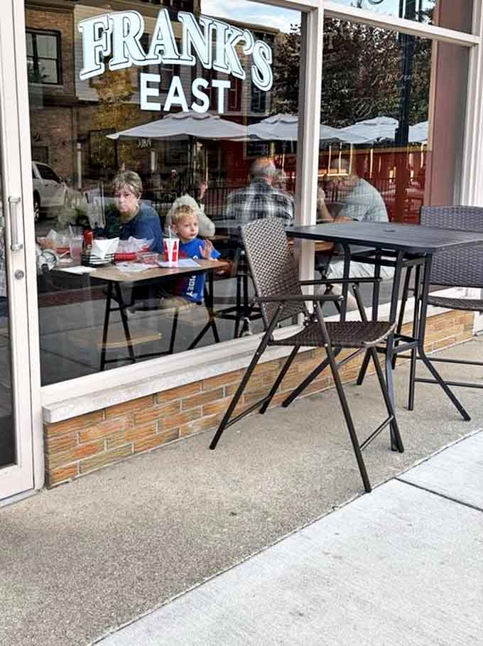Outside Seating: Where summer afternoons stretch into perfect evenings as burgers disappear and conversations flow under Michigan skies.