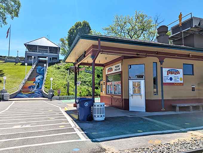 Steps lead up from the pizzeria to scenic views, perfectly positioned for a post-pizza stroll to work off those delicious extra calories.