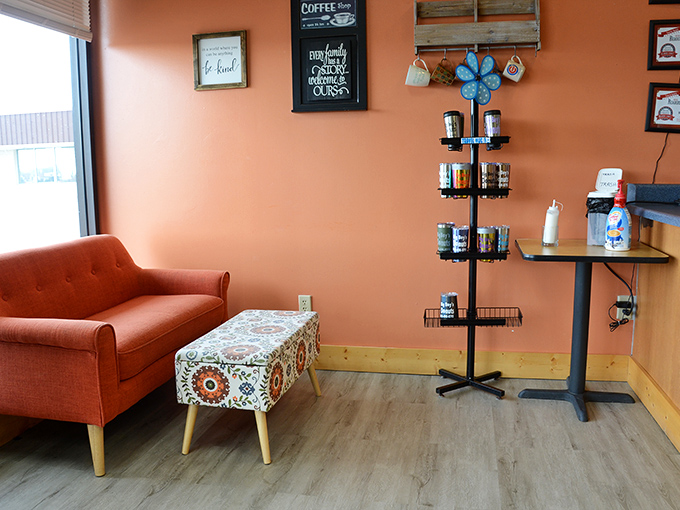 The cozy corner invites you to stay awhile – because donuts taste better when enjoyed slowly in good company.