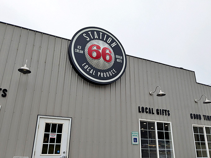 Even on cloudy days, the Station 66 sign serves as a beacon for hungry travelers &ndash; promising good food, warm welcomes, and a brief escape from the ordinary.