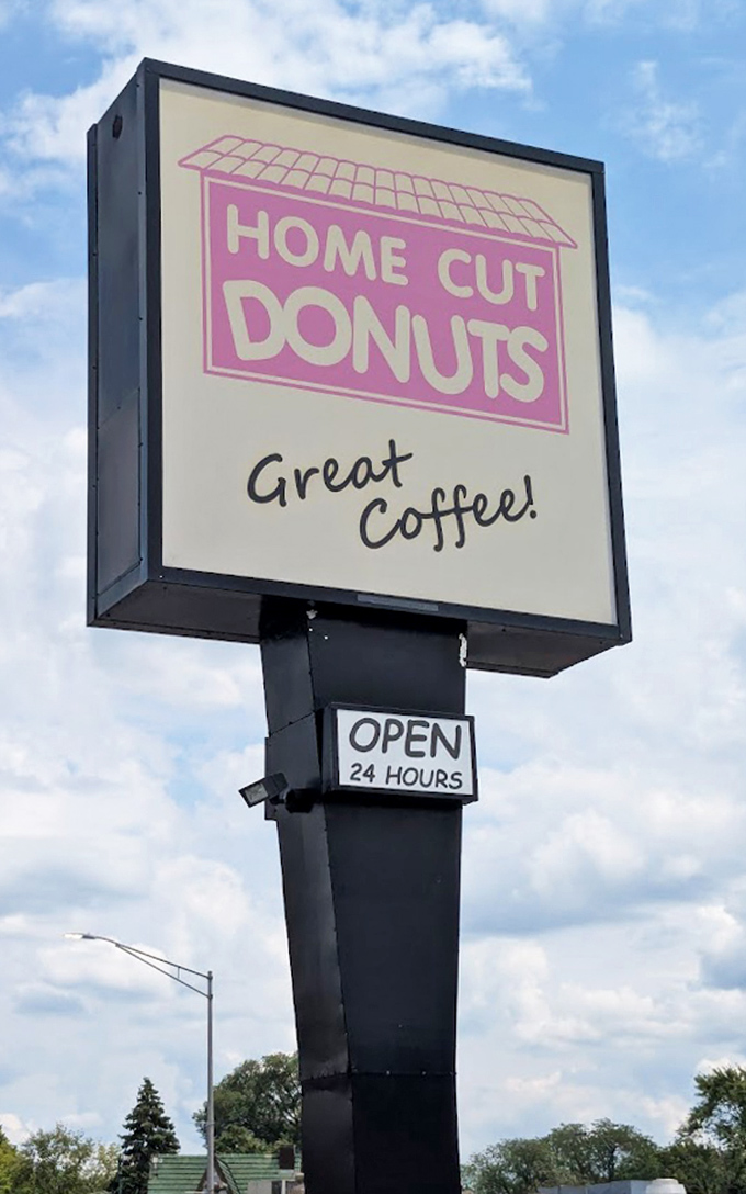 Signage: The pink beacon that guides hungry pilgrims to donut nirvana, with its humble promise of "Great Coffee!" that undersells the excellence within.