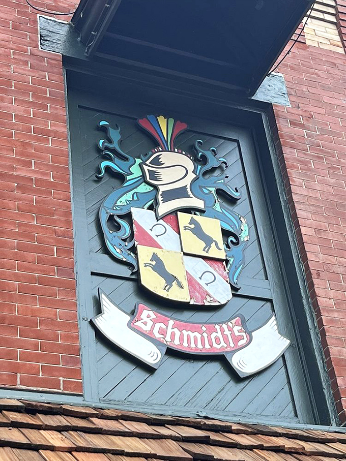 The Schmidt's family crest proudly displayed above the entrance &ndash; a colorful herald announcing generations of German culinary tradition in Columbus.