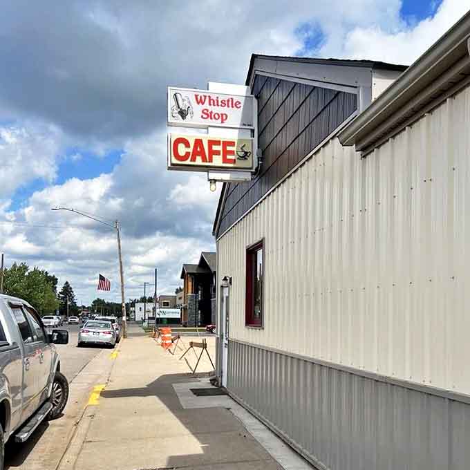 The beacon of breakfast hope along Main Street &ndash; where that simple "CAFE" sign promises more satisfaction than any fancy restaurant with unpronounceable menu items.