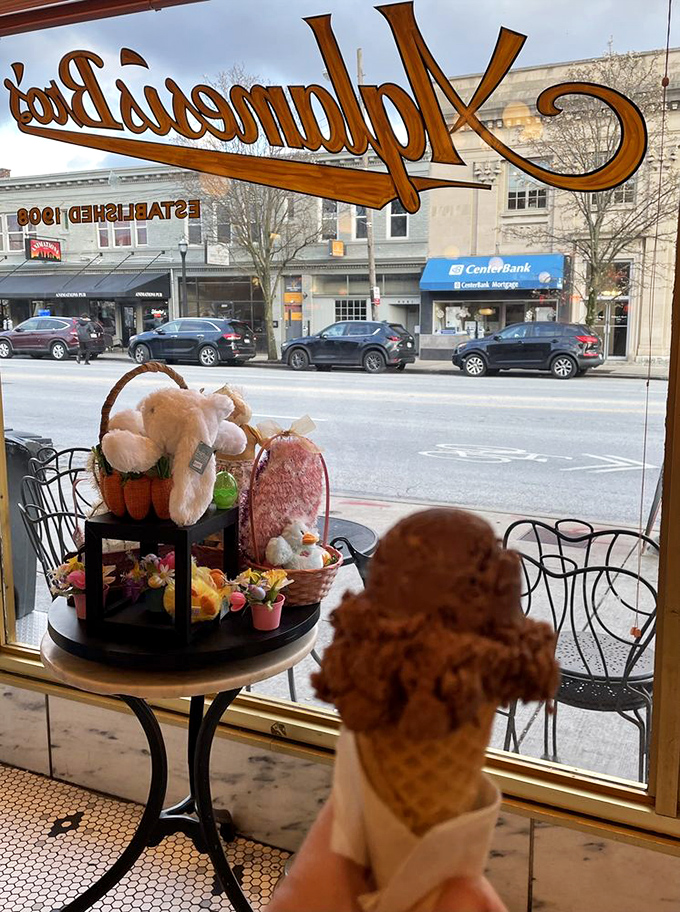 The view from inside looking out &ndash; where the real world waits while you enjoy one more spoonful of frozen perfection in this timeless sanctuary.