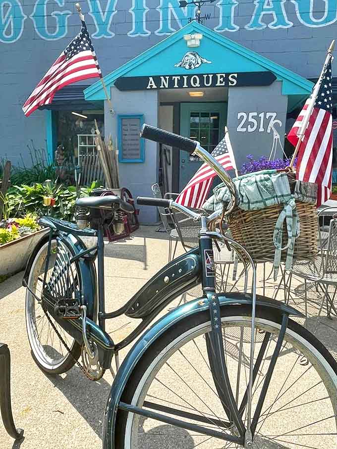 This isn't just transportation, it's time travel on two wheels. The vintage bicycle with its basket and flags stands ready for a leisurely ride through simpler times.