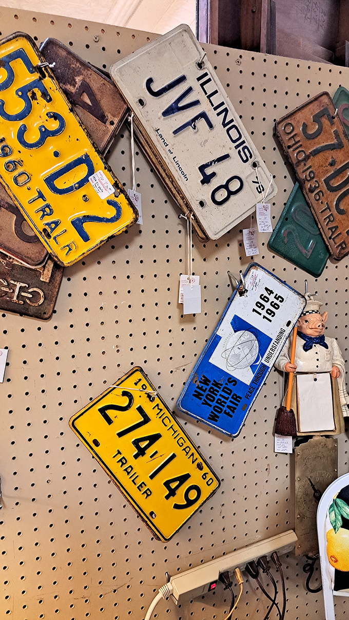 These vintage license plates chart a road trip through American history, each one a rectangular time capsule from another era.