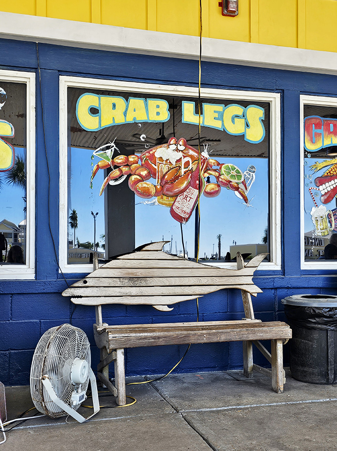 The blue and yellow exterior isn't just beach-themed décor—it's a promise that the ocean's best offerings are waiting just beyond those doors.