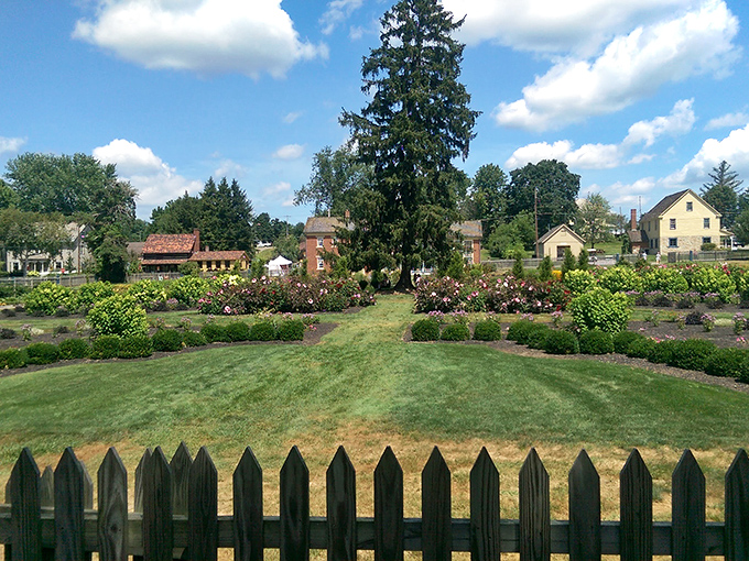 The meticulously maintained Zoar Garden represents paradise in plant form, its geometric precision and symbolic design showcasing the Separatists' spiritual and practical values.