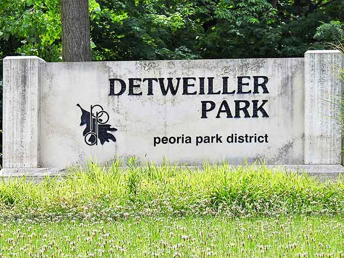 Detweiller Park's entrance sign: the modest doorway between everyday life and extraordinary adventure, no passport required.