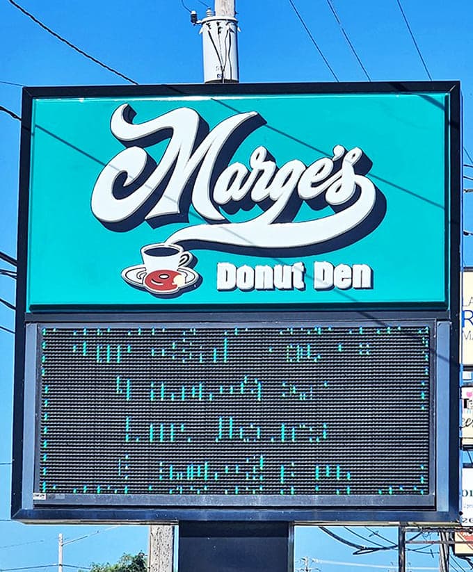 Signage: The beacon of baked goods beckons from the roadside. That turquoise sign isn't just advertising&mdash;it's a promise of deliciousness.
