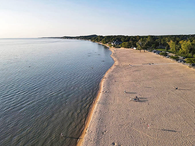 An aerial view reveals Stearns Park Beach in all its glory &ndash; where 2,500 feet of shoreline meets the endless blue of Lake Michigan.