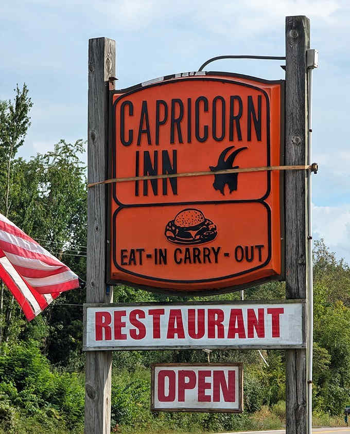 The iconic orange Capricorn Inn sign stands as a beacon to burger lovers &ndash; like a lighthouse guiding hungry sailors to delicious shores.