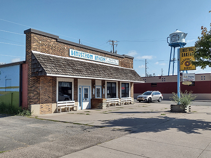 Lindstr&ouml;m Bakery's charming brick storefront welcomes visitors with its vintage sign and promise of Scandinavian treats inside.