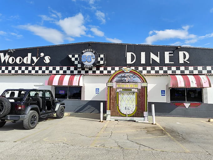 The iconic jukebox entrance at Woody's welcomes diners into a world where Elvis is king and milkshakes rule the menu.