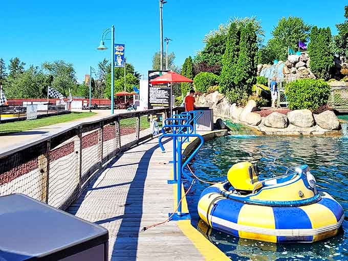 Colorful floating vessels lined up like a carnival on water, each one a potential weapon in the splashiest battle you'll have all summer.