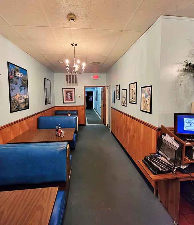 Blue vinyl booths and Greek island photos create the perfect backdrop for your baklava adventure, no passport required.