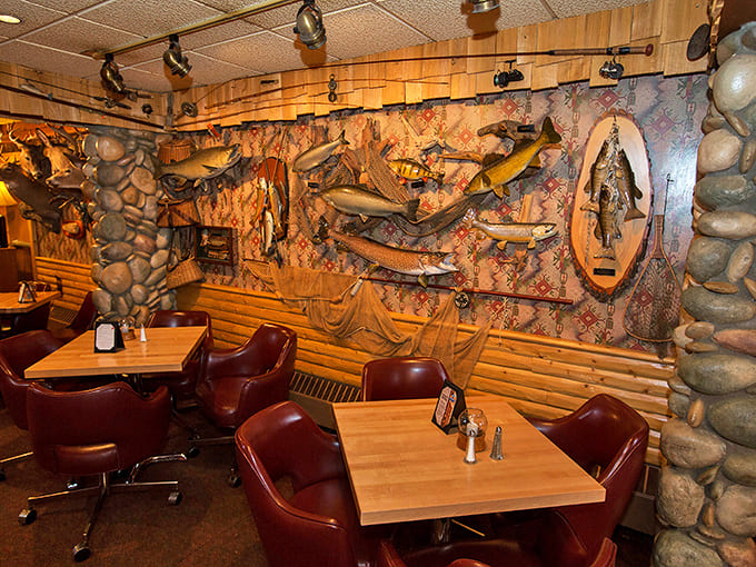 Mounted fish swim eternally along wood-paneled walls, telling silent stories of legendary catches from Michigan's pristine waters.