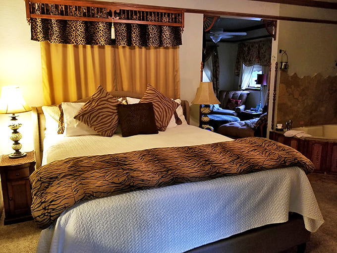 Drift into dreams surrounded by animal prints and plush comfort – this bedroom blends Victorian charm with a touch of wild elegance.