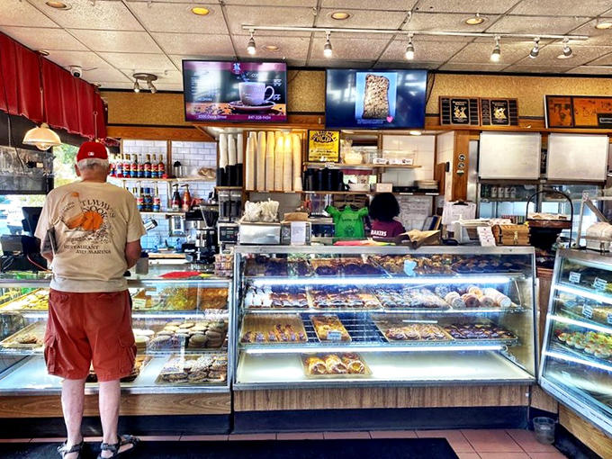 Those display cases hold more temptation than most people can handle before breakfast, and that's exactly the point of a proper bakery.