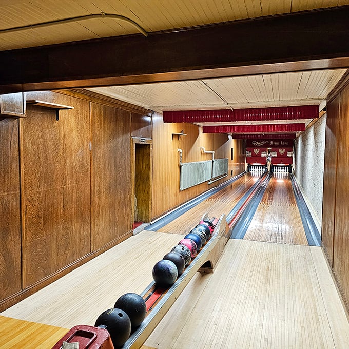 Step into bowling's time capsule where wooden lanes stretch before you, unchanged since the days when scorekeeping required actual math.