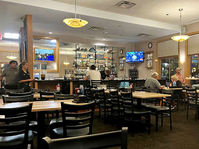 The warm, inviting interior strikes that perfect balance between casual and cozy, with a well-stocked bar ready to quench any thirst.