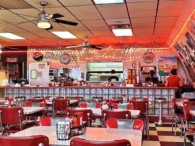 Retro diner perfection: Cherry-red booths, chrome accents, and a counter straight from the 1950s &ndash; this isn't manufactured nostalgia, it's the real deal.