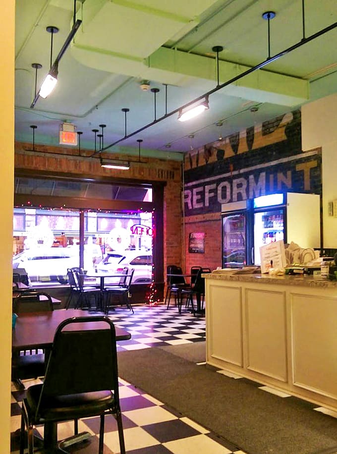 Step inside to a nostalgic black-and-white checkered floor and exposed brick walls&mdash;a cozy time capsule where pastry dreams come true.