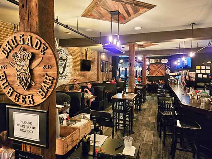 Step inside and medieval meets modern &ndash; exposed brick, wooden beams, and that commanding Crusader emblem letting you know this isn't your average burger joint.