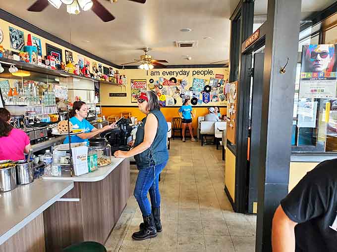 Where nostalgia meets hunger - bright blue uniforms, vintage memorabilia, and the promise of "everyday people" finding their breakfast bliss.