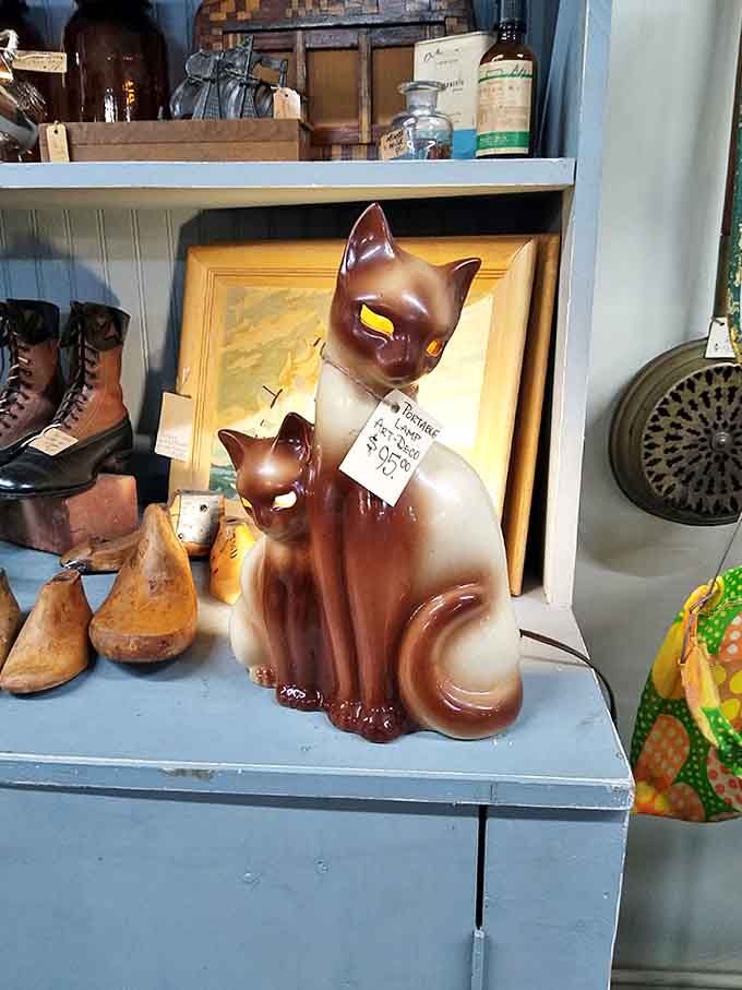 This ceramic cat duo proves that vintage charm has nine lives, and they're all adorable.